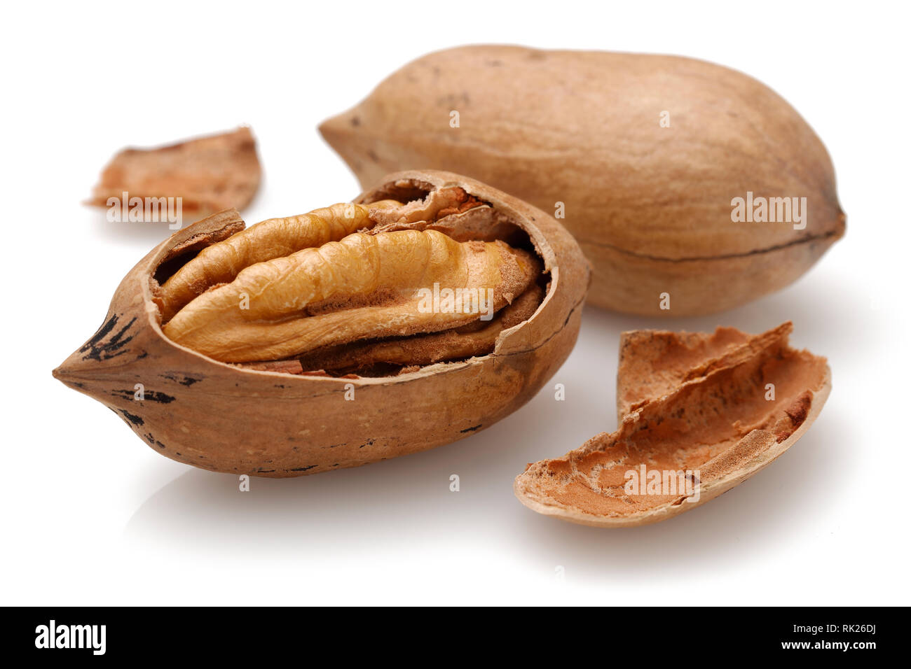 Unpeeled organic pecan nuts Cut Out Stock Images & Pictures - Alamy