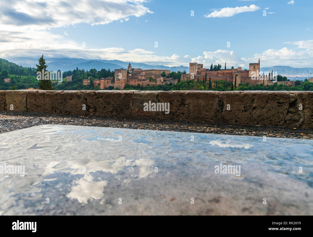 Sunrise above Alhambra palace and fortress seen from an old stone ...