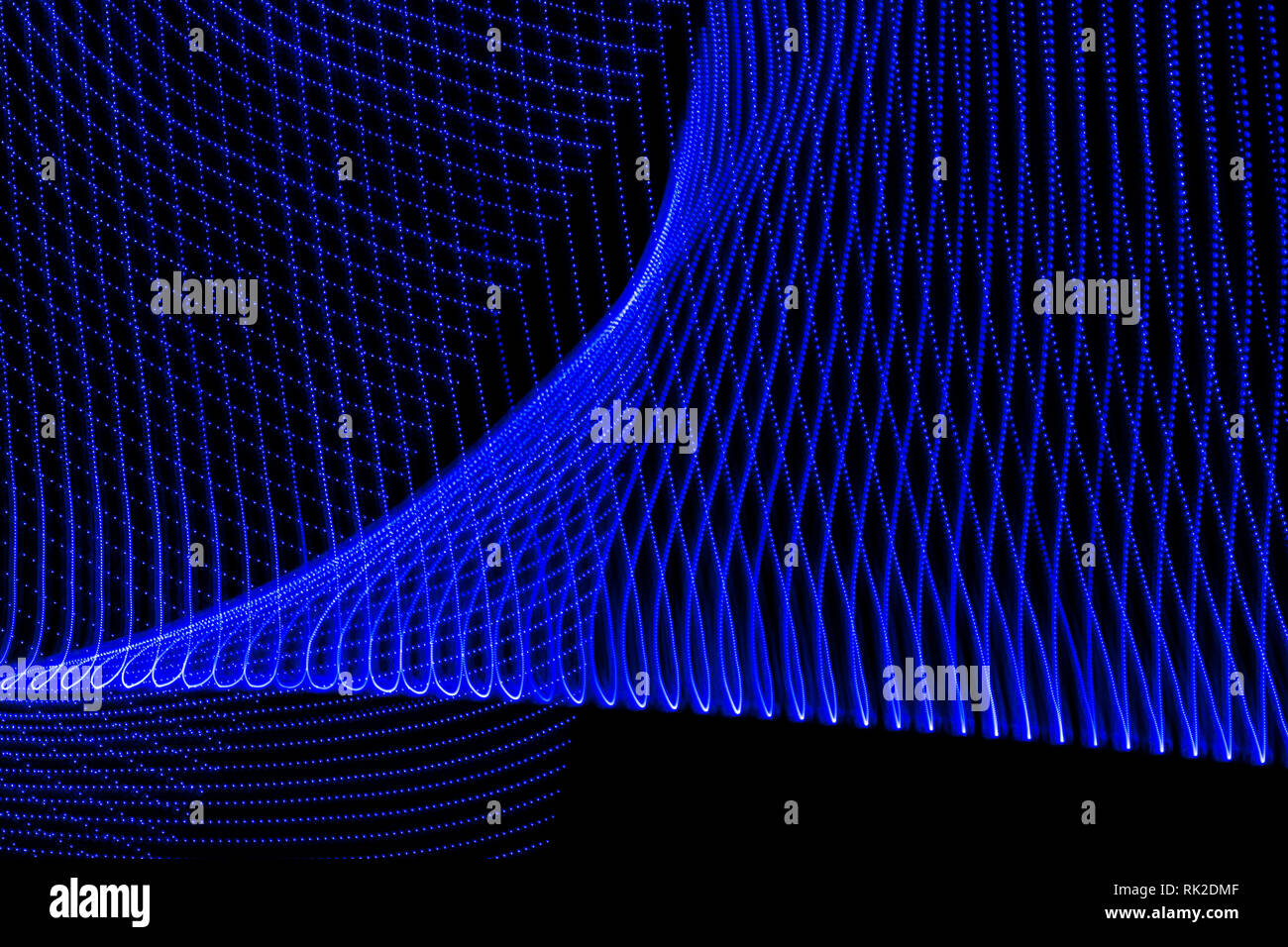 Abstract lines formed by dots of blue color. Futuristic patterns of ...