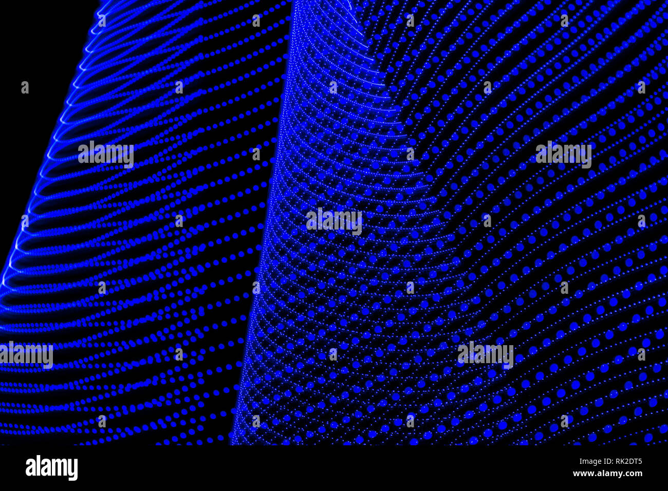 Abstract lines formed by dots of blue color. Futuristic patterns of ...