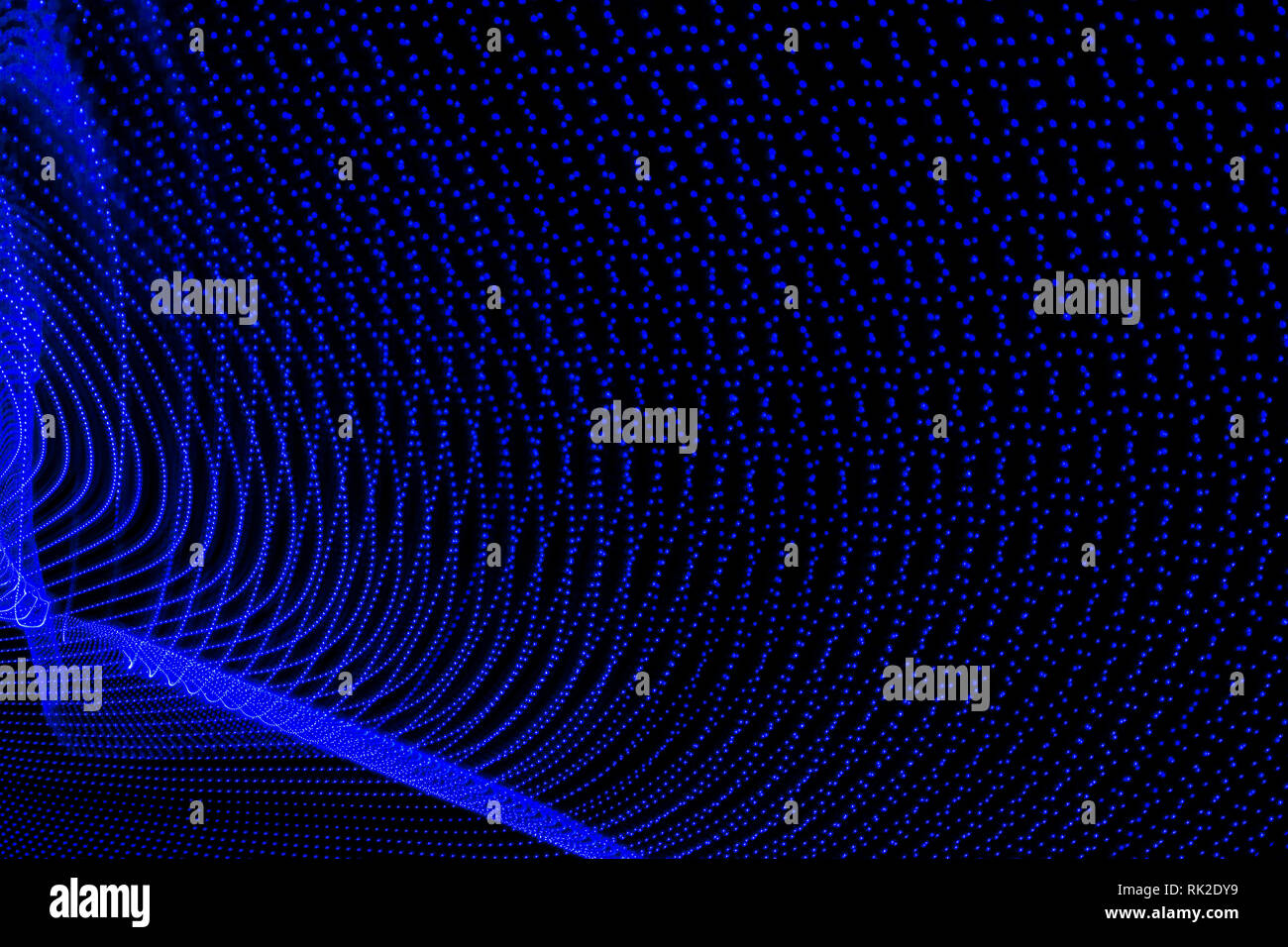 Abstract lines formed by dots of blue color. Futuristic patterns of ...