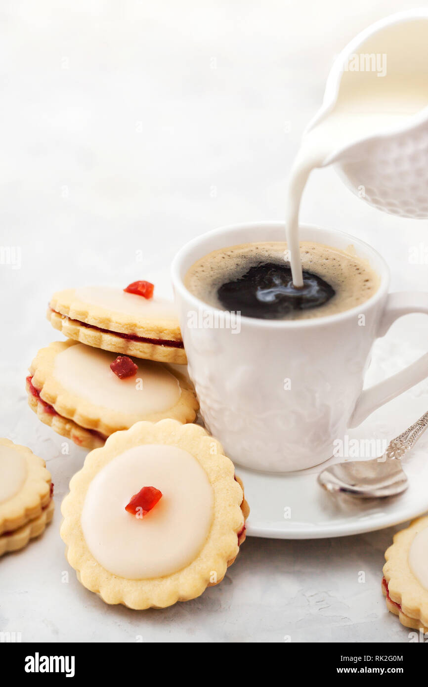 Empire shortbread sandwich cookies and cup of coffee Stock Photo - Alamy