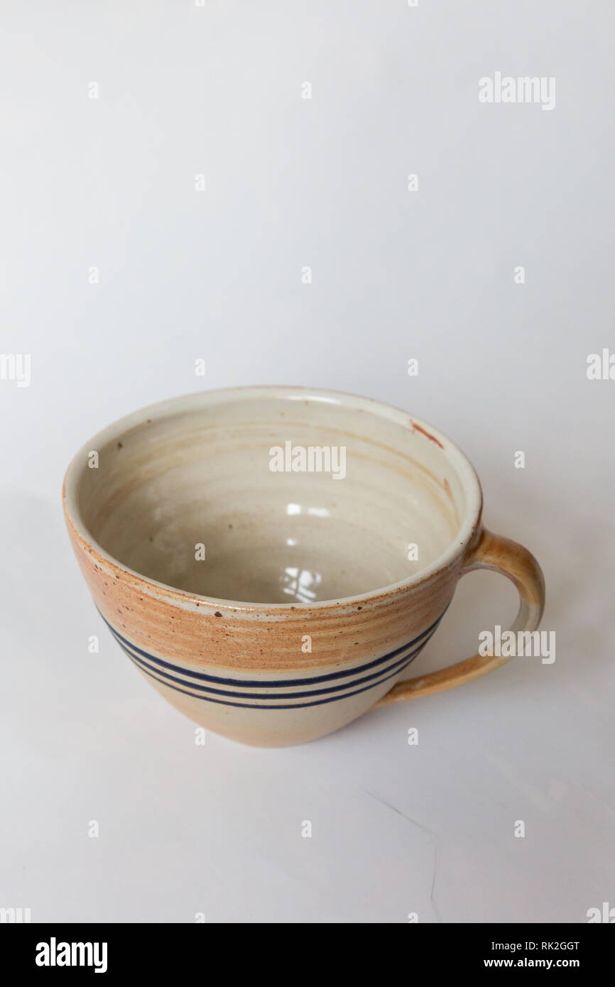 a cup with pattern on white background background Stock Photo - Alamy