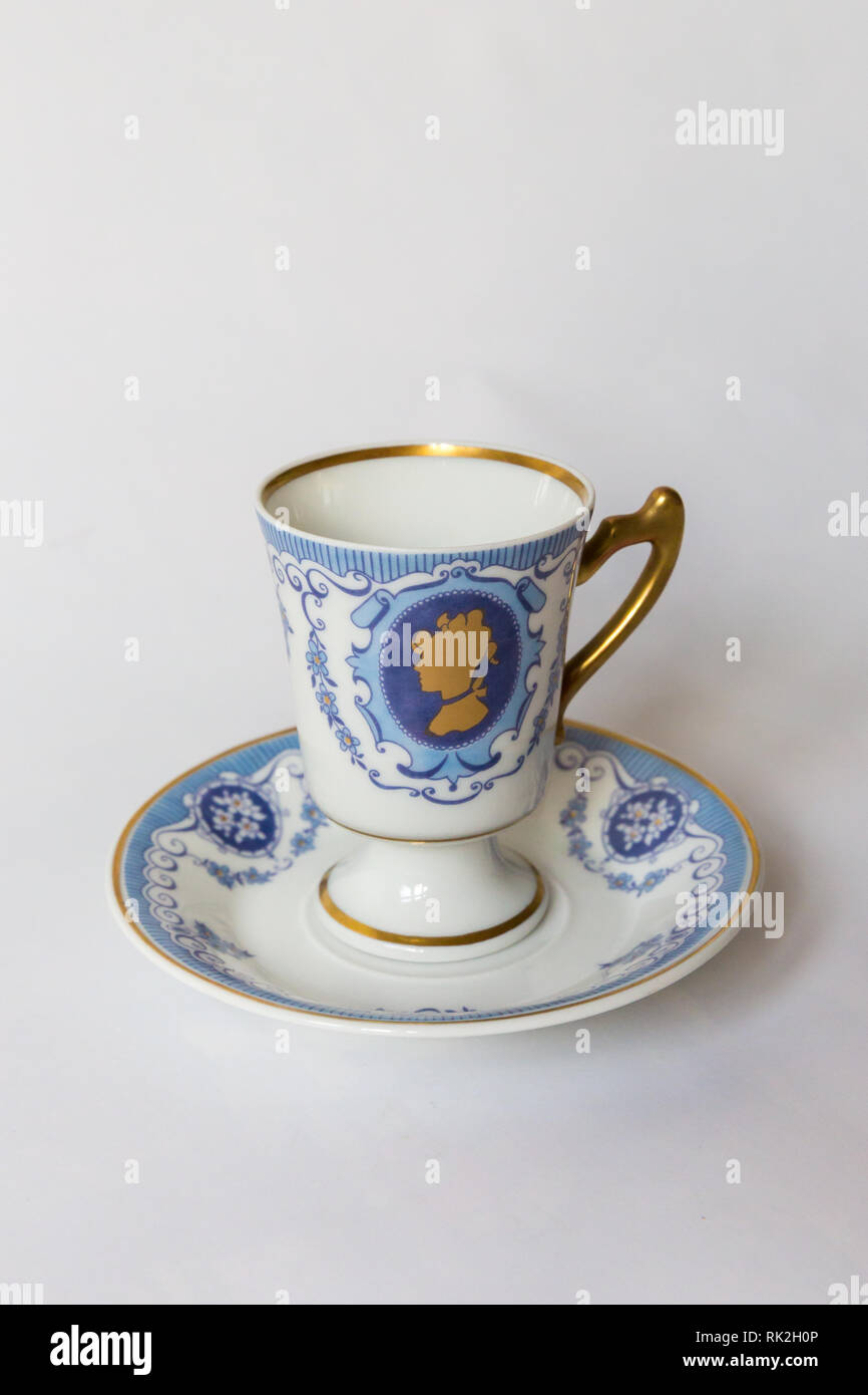 a white tea set with pattern on white background Stock Photo - Alamy