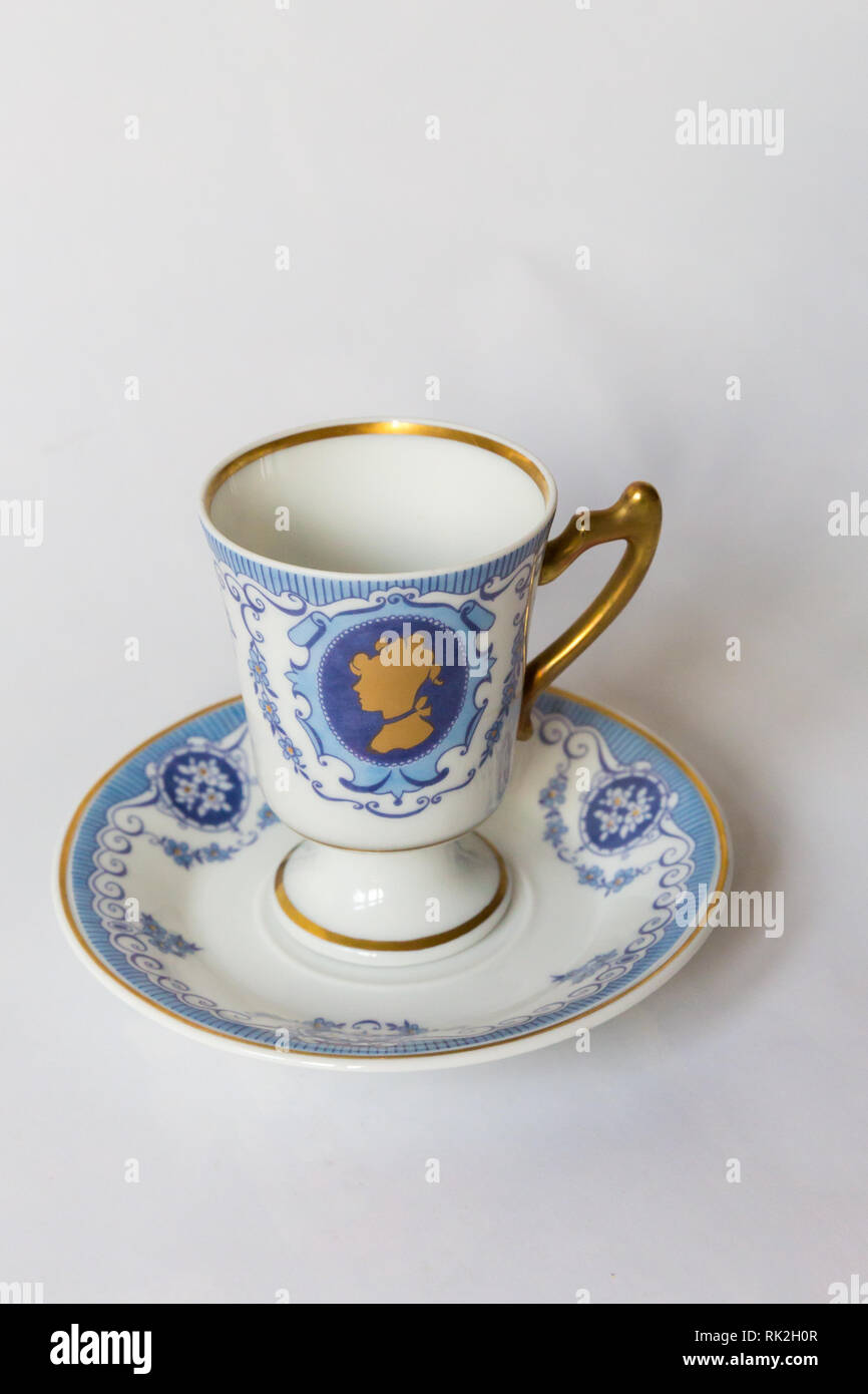 a white tea set with pattern on white background Stock Photo - Alamy