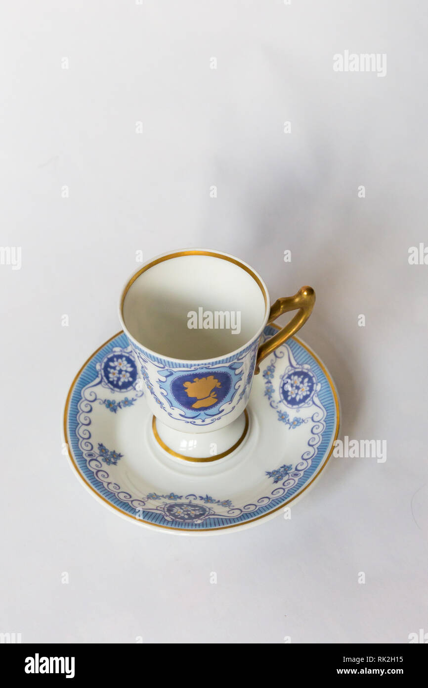a white tea set with pattern on white background Stock Photo - Alamy