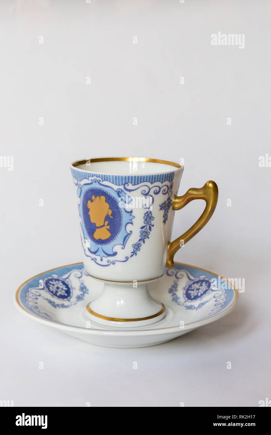 a white tea set with pattern on white background Stock Photo - Alamy