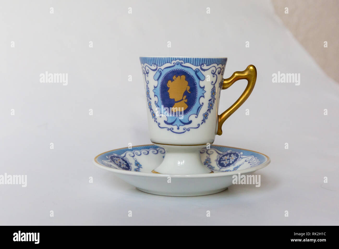a white tea set with pattern on white background Stock Photo - Alamy