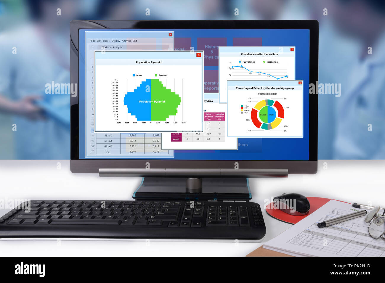 Health statistics tables and charts showing on computer monitor Stock ...
