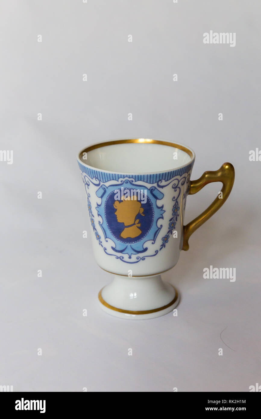 a white tea set with pattern on white background Stock Photo - Alamy
