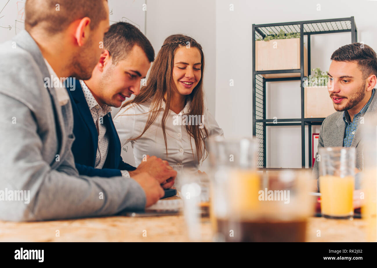 Young managers having discussion hi-res stock photography and images ...