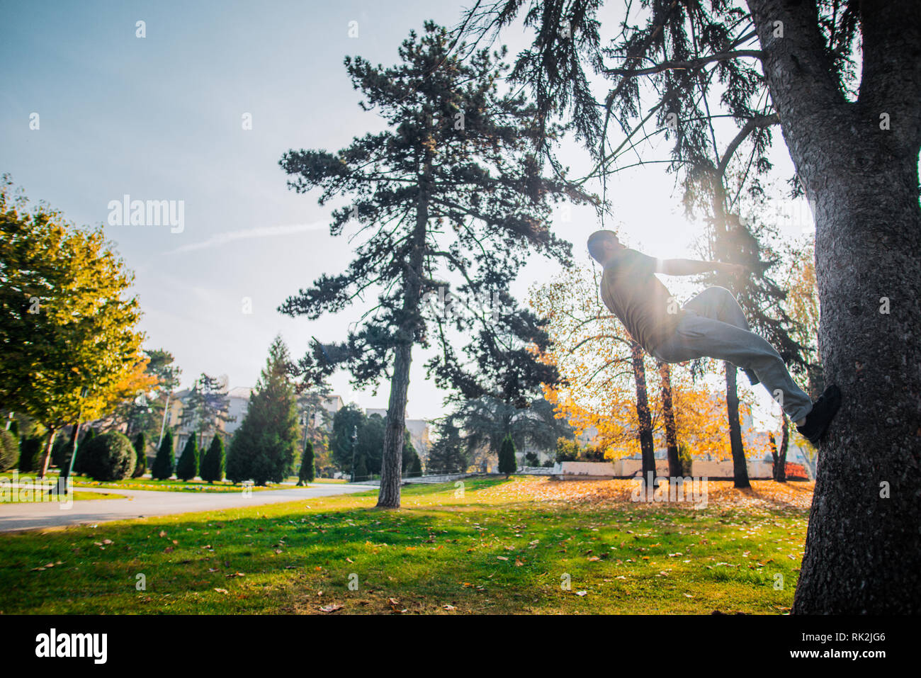 Training day of young traceur while doing parkour jumping Stock Photo ...