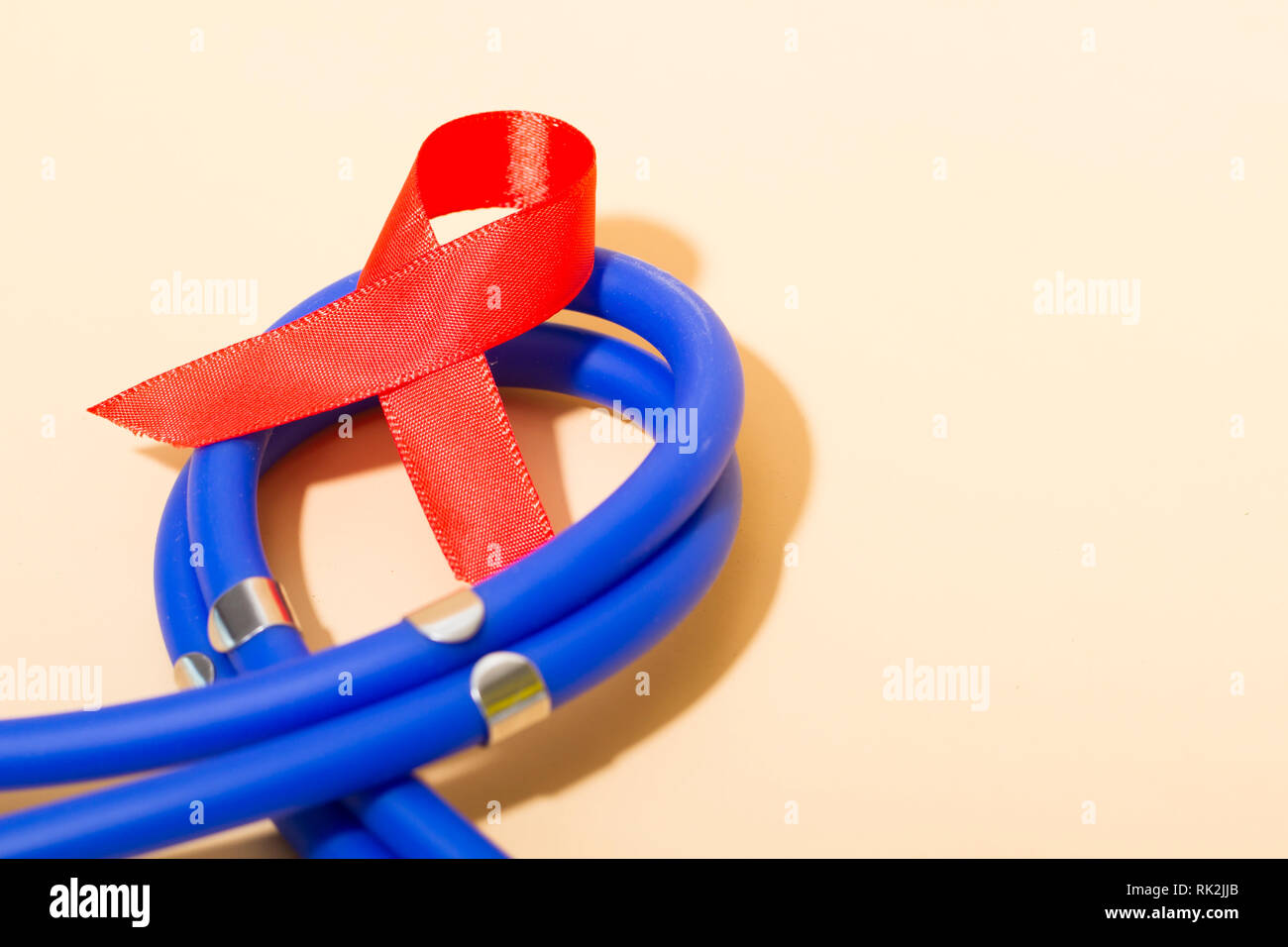 Red ribbon sign Stock Photo - Alamy