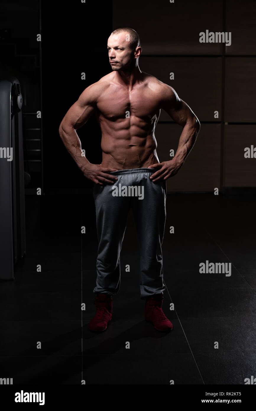 Portrait Of A Young Physically Fit Man Showing His Well Trained Body ...