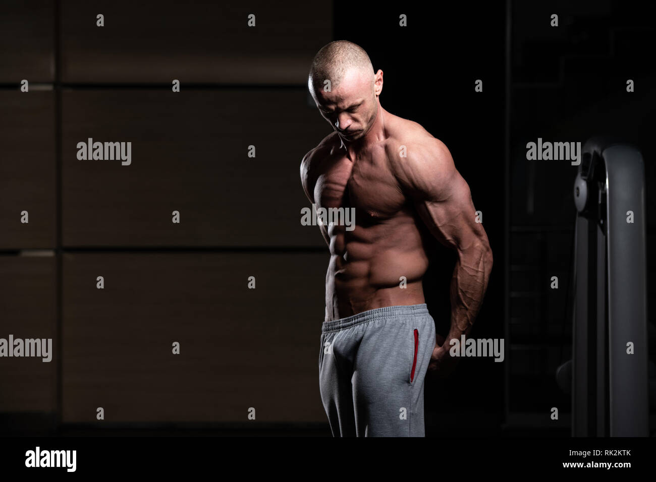 Portrait Of A Young Physically Fit Man Showing His Well Trained Body ...