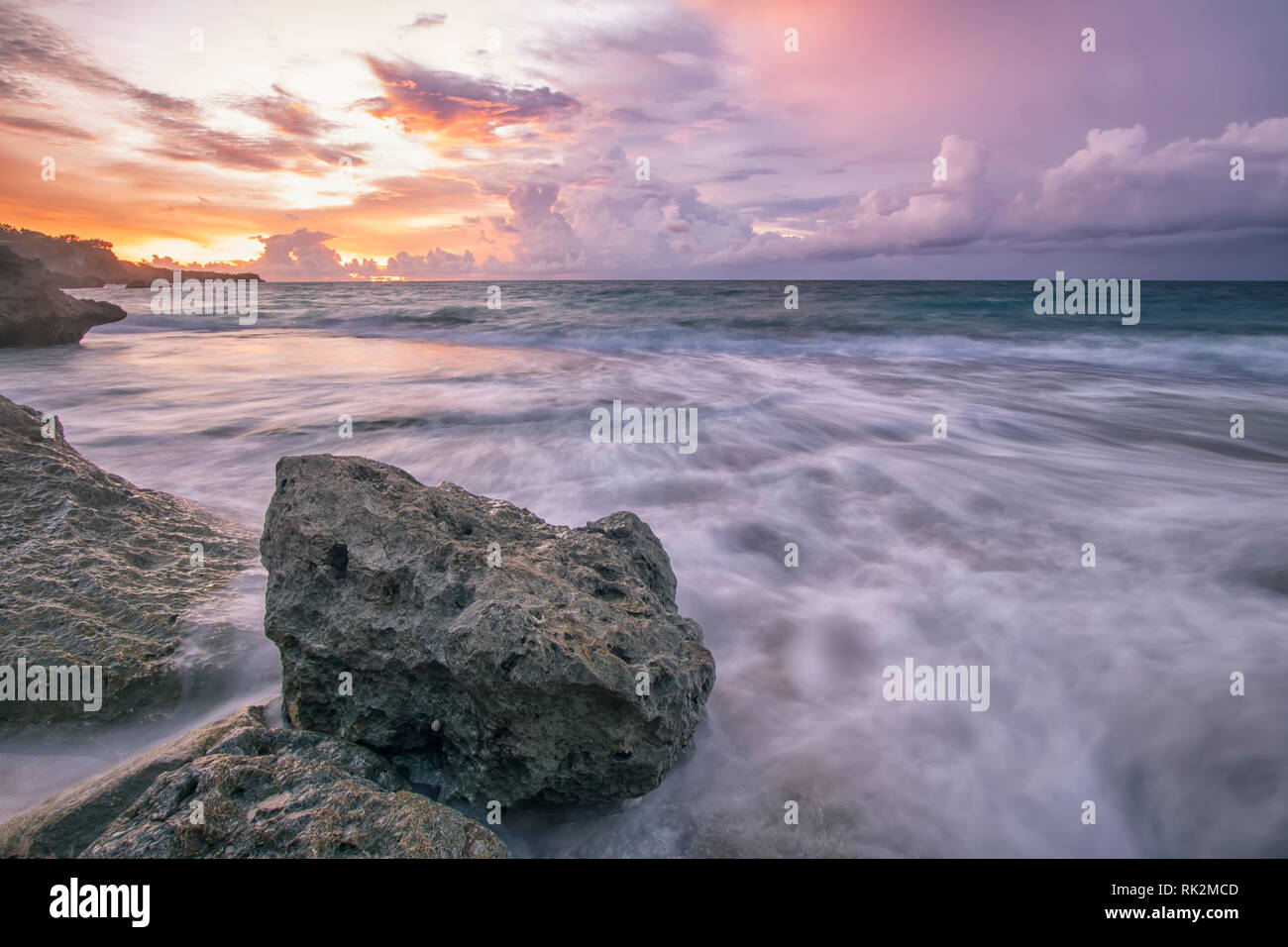 Beautiful Sunset at Tegal Wangi Beach Bali, Indonesia Stock Photo - Alamy