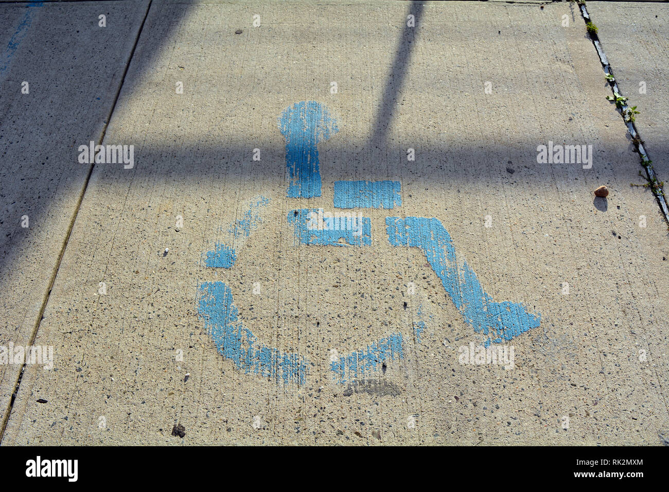 Faded Blue Handicap Icon In Parking Stall Stock Photo - Alamy