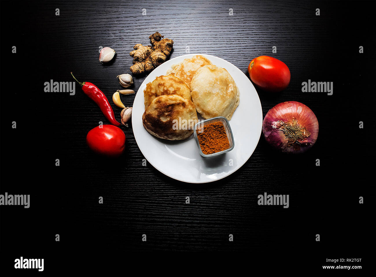 Popular Nigerian Meals - An overhead shot of Moussa and dry pepper ...