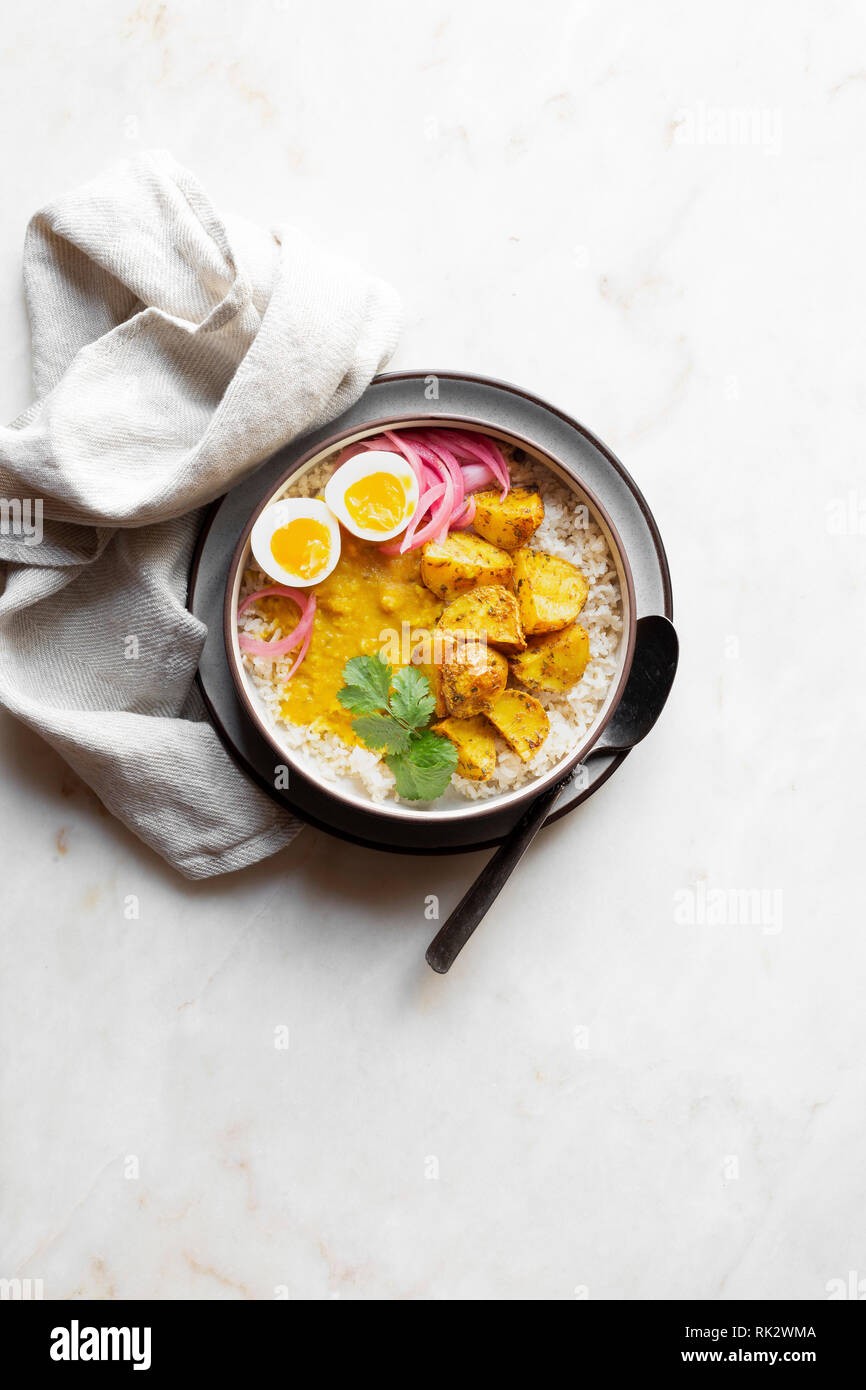 Dal, rice, potato, egg and onion - Indian vegetarian dinner Stock Photo ...