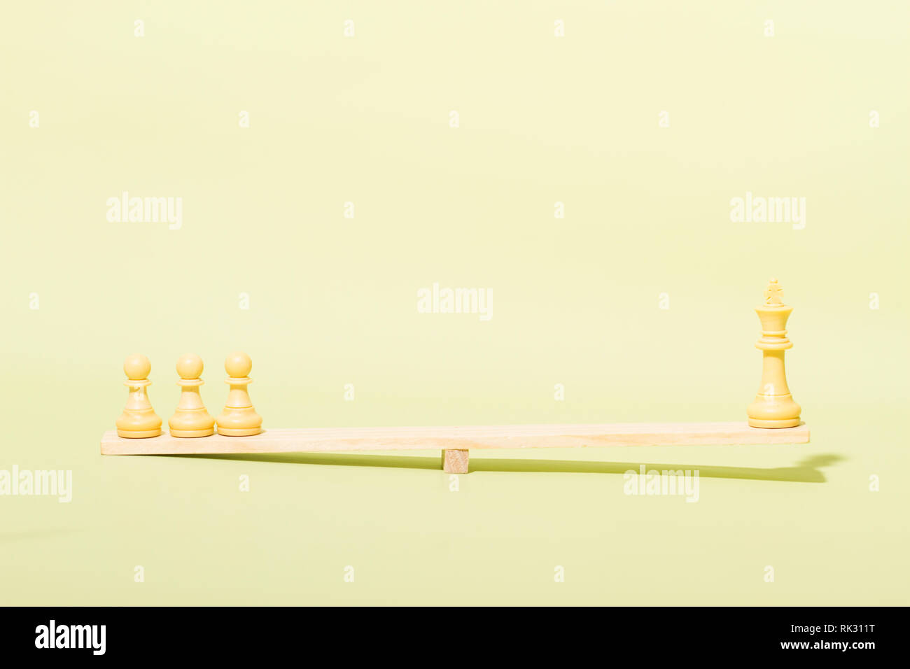 Balance between chess pieces Stock Photo - Alamy