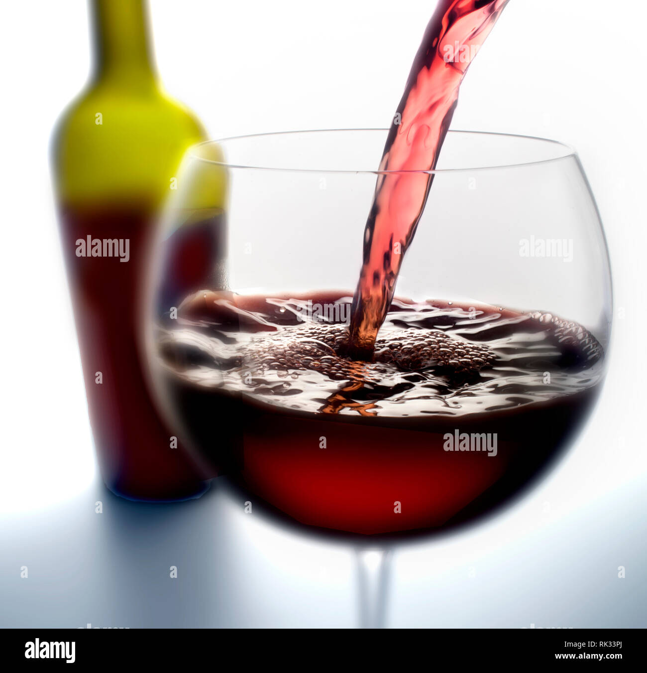 wine glass pour red Stock Photo - Alamy