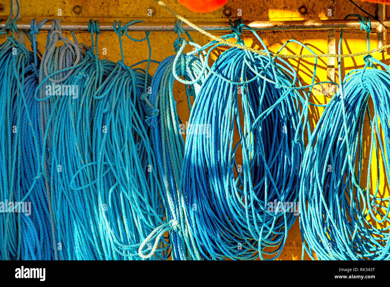 ropes of fishing nets on a trawler Stock Photo - Alamy