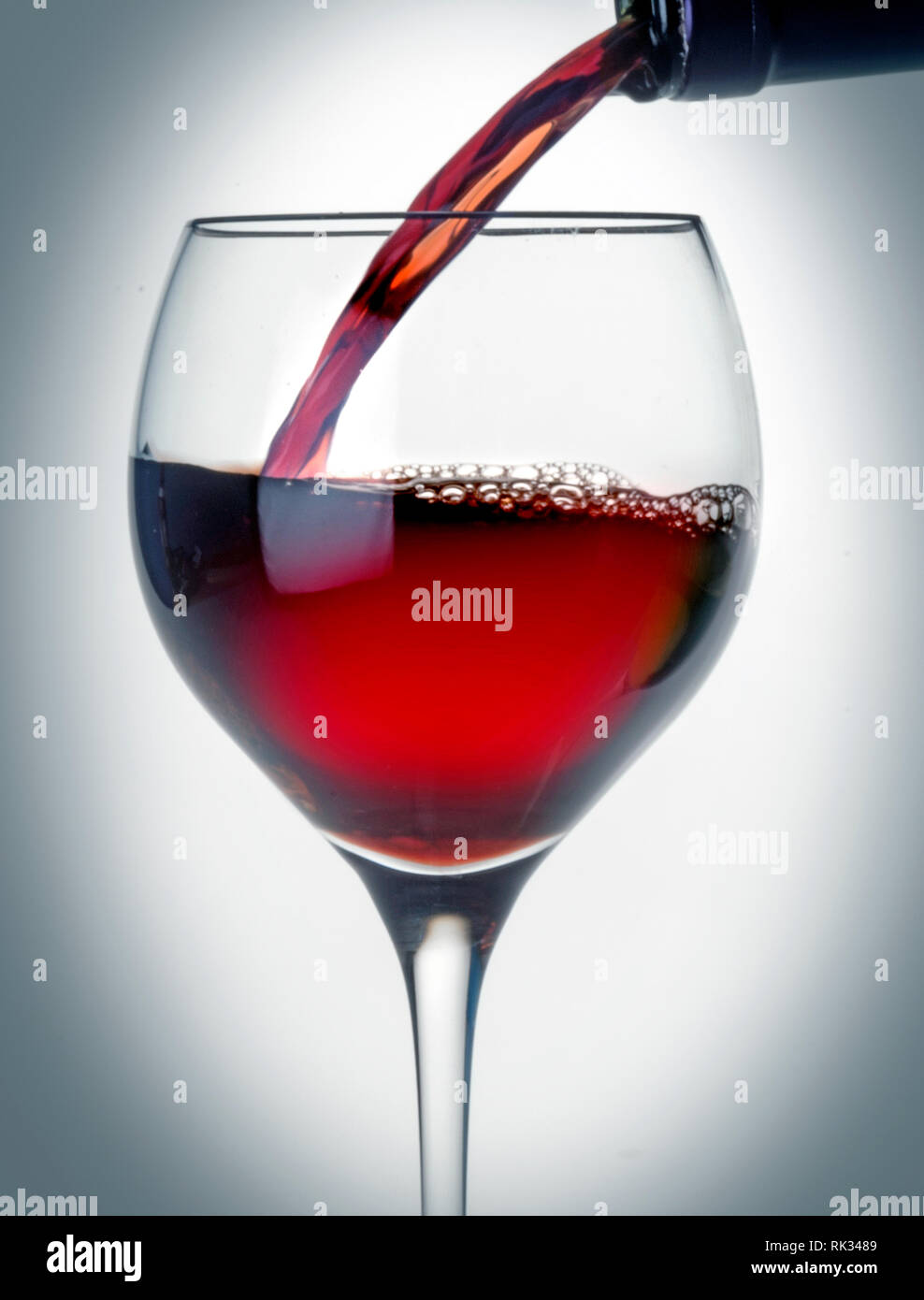 wine glass pour red Stock Photo - Alamy