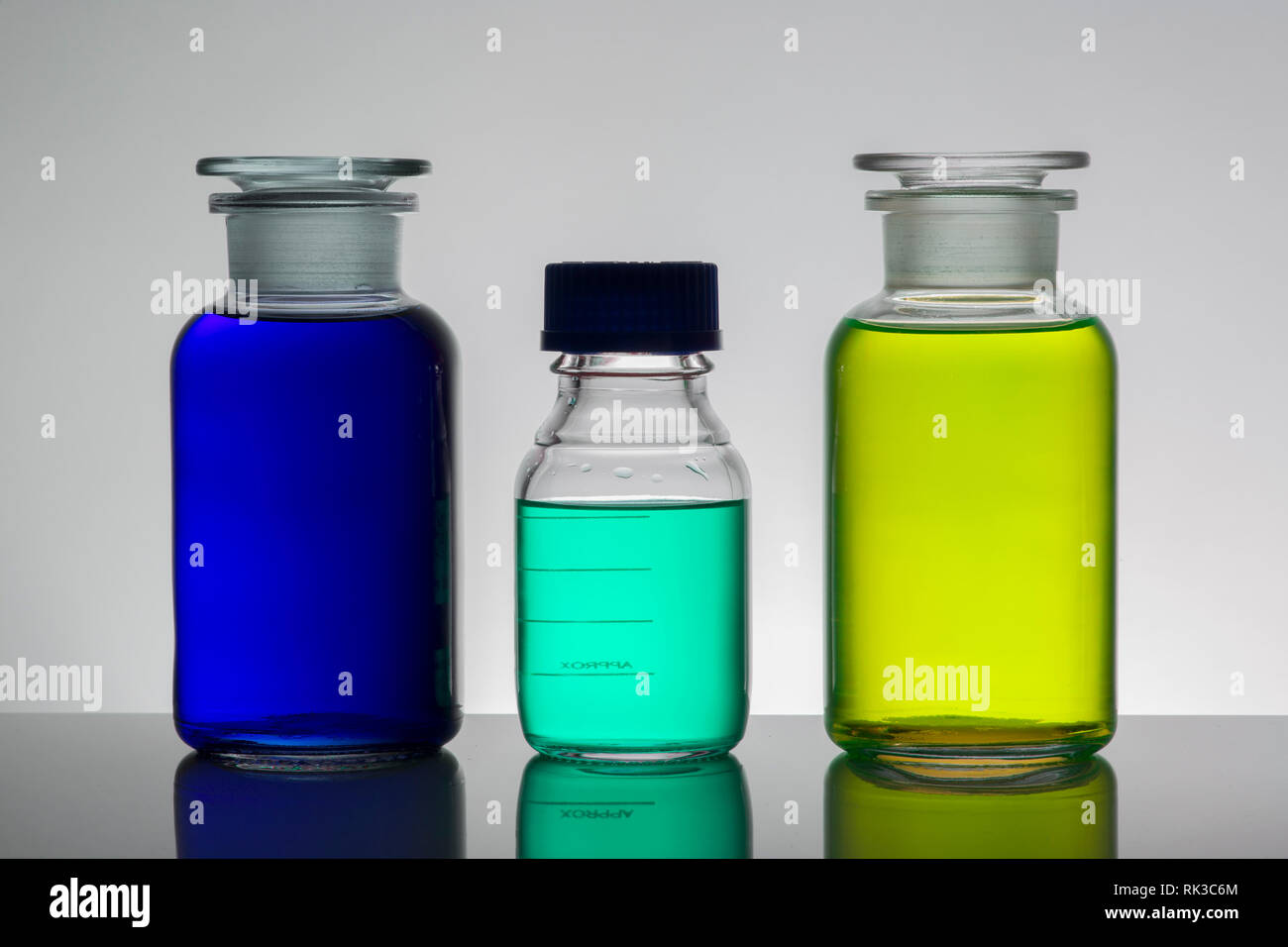 Liquid in laboratory bottles. Scientific biochemical laboratory ...