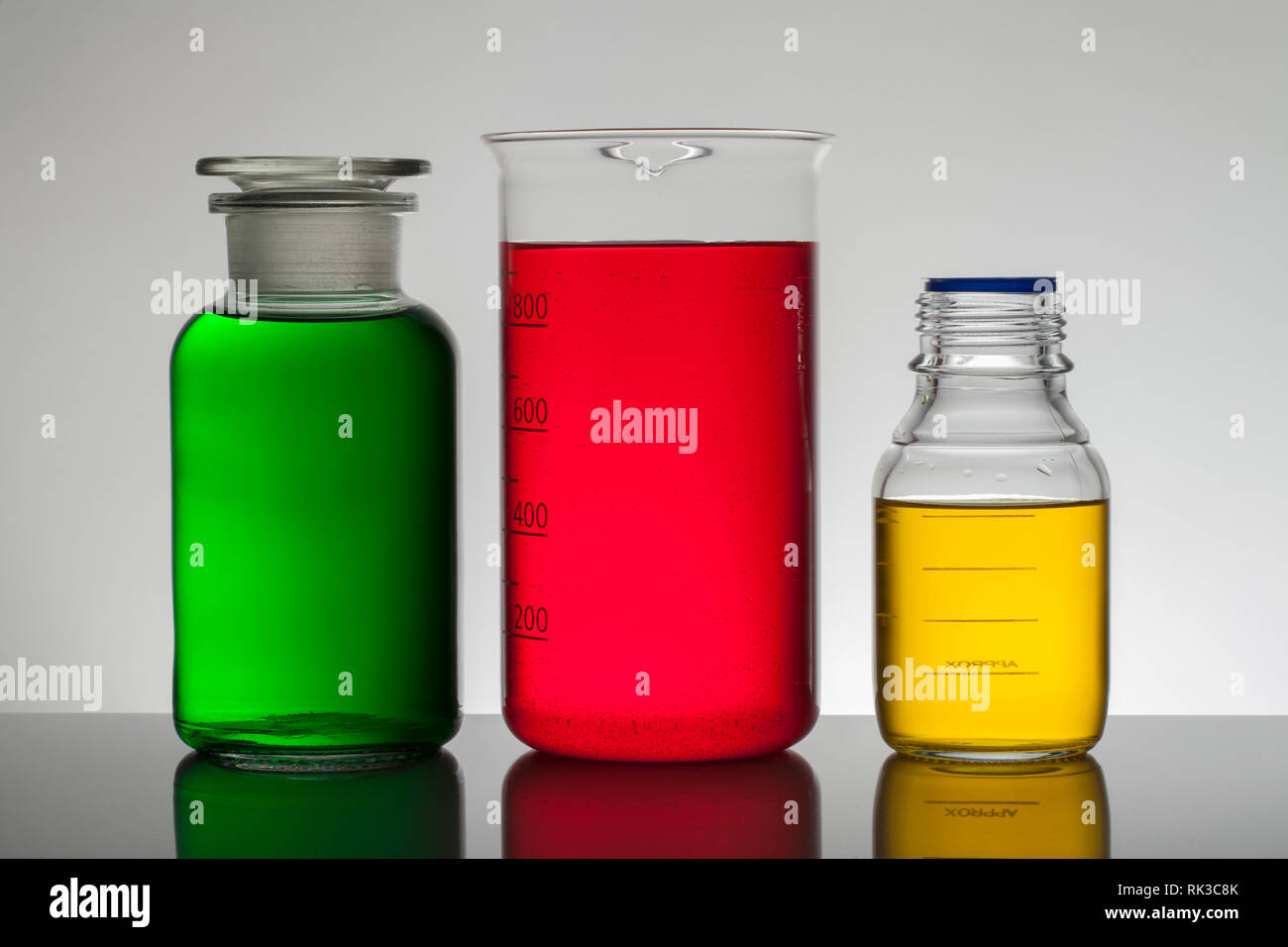 Liquid in laboratory bottles. Scientific biochemical laboratory ...