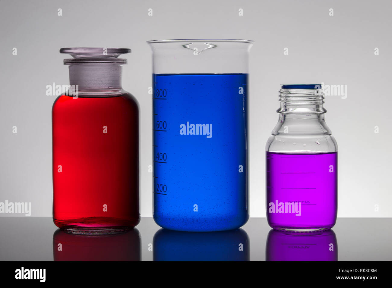 Liquid in laboratory bottles. Scientific biochemical laboratory ...