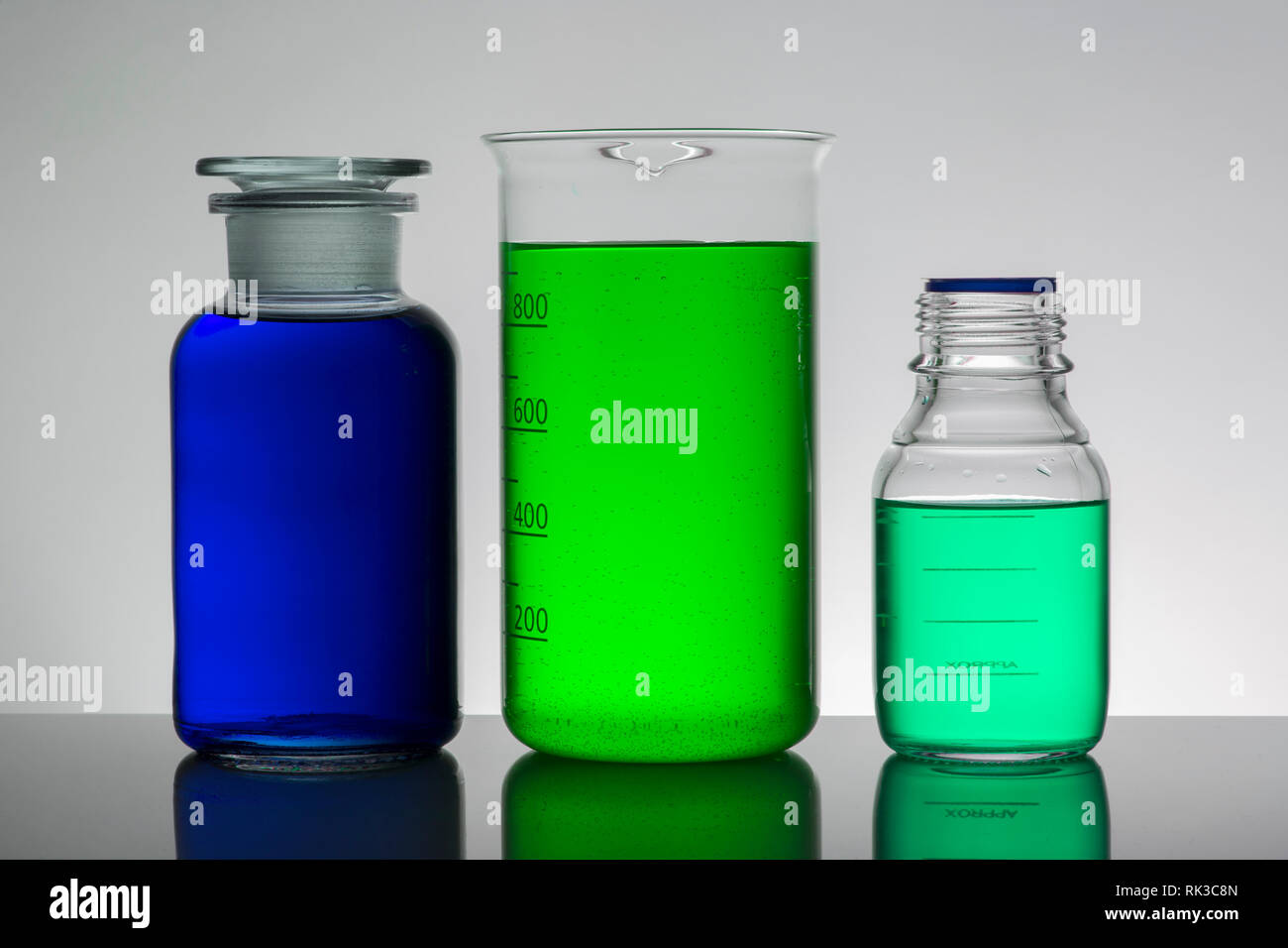 Liquid in laboratory bottles. Scientific biochemical laboratory ...