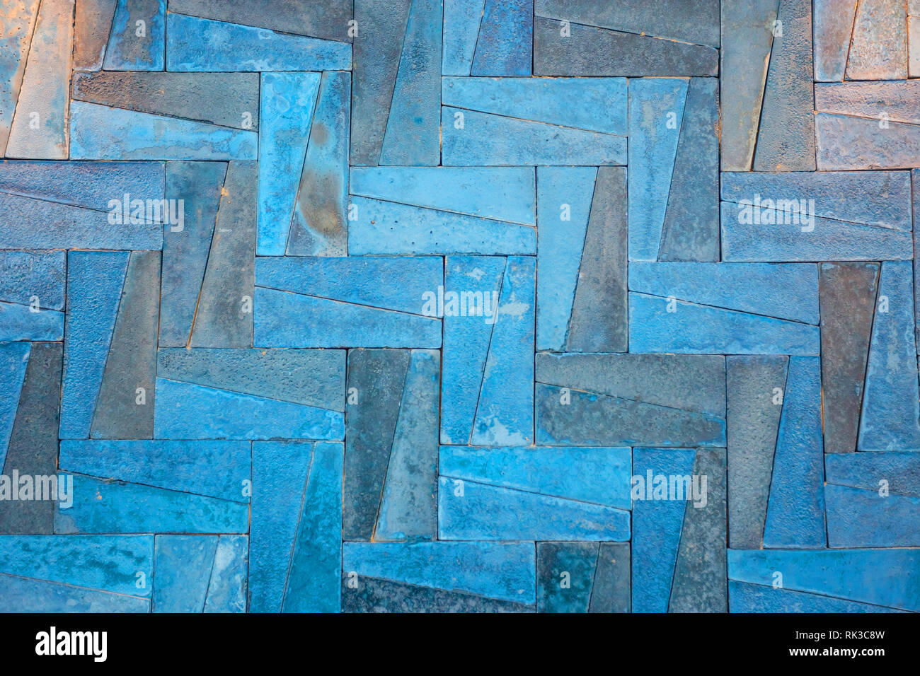 Blue tiles on a floor making a pattern Stock Photo - Alamy