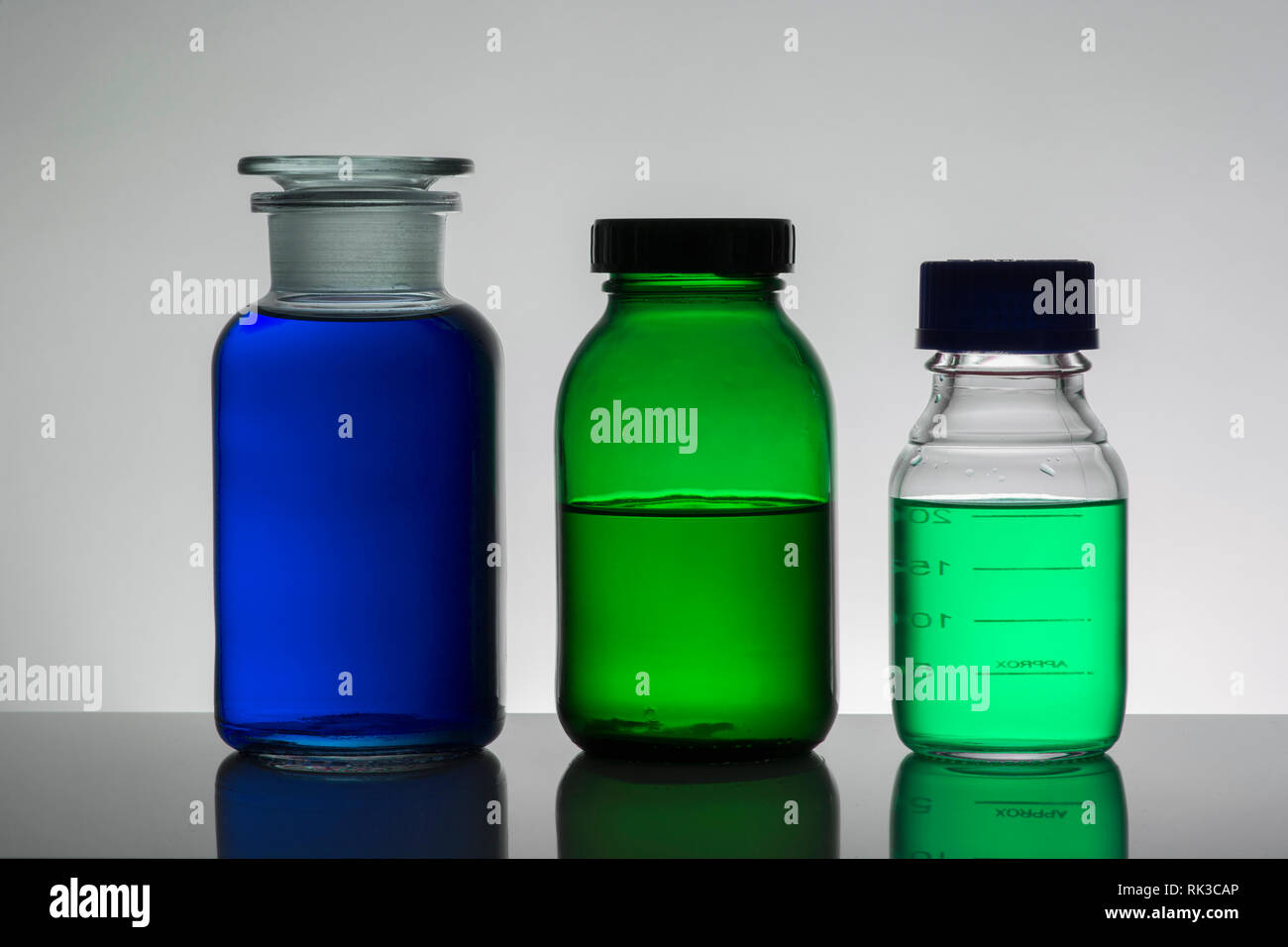 Liquid in laboratory bottles. Scientific biochemical laboratory ...