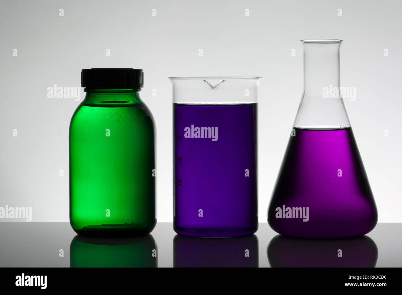 Liquid in laboratory bottles. Scientific biochemical laboratory ...