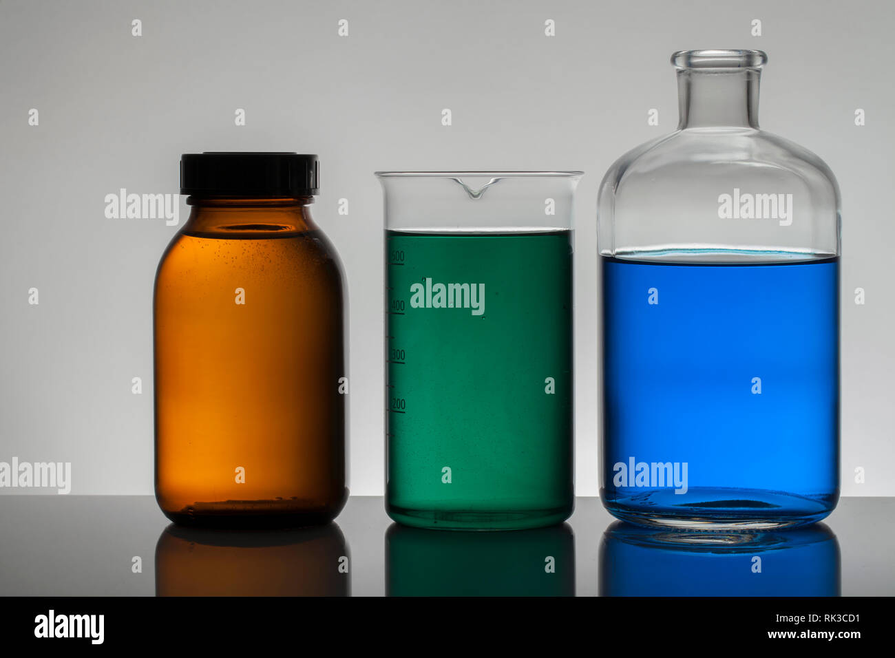 Liquid in laboratory bottles. Scientific biochemical laboratory ...