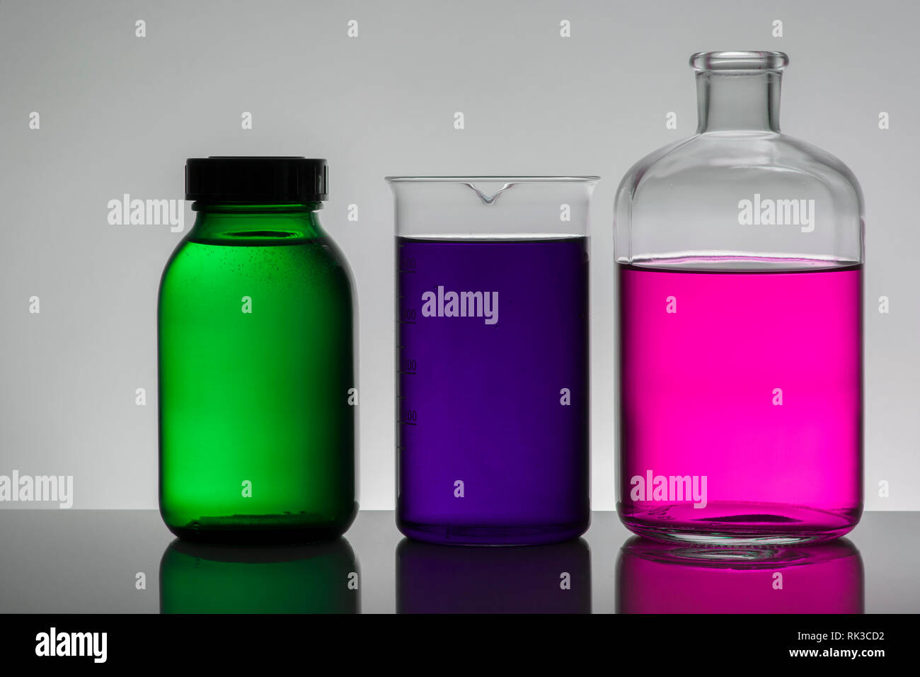 Liquid in laboratory bottles. Scientific biochemical laboratory ...