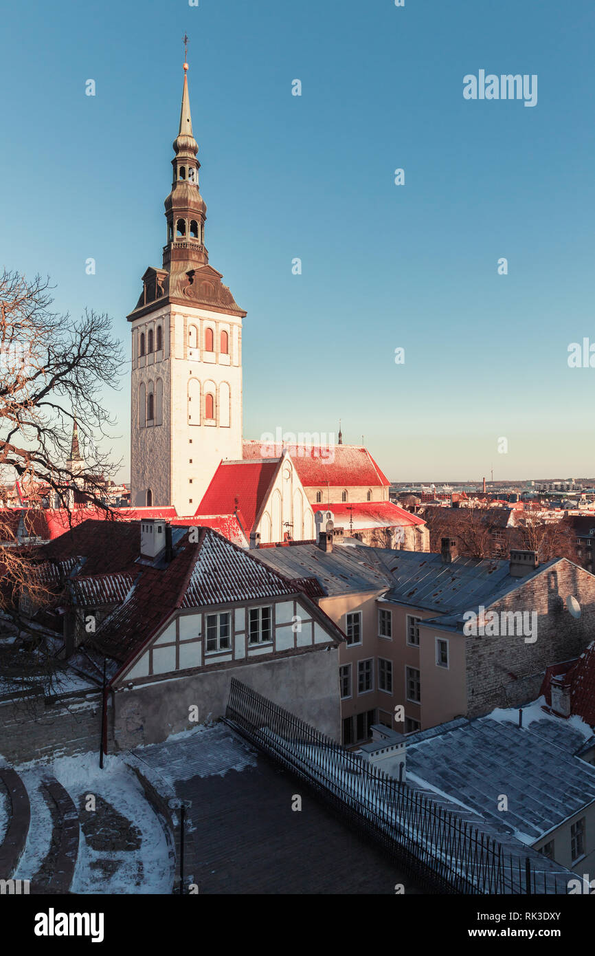 Tallinn, Estonia. Vertical cityscape with old houses and St. Nicholas ...