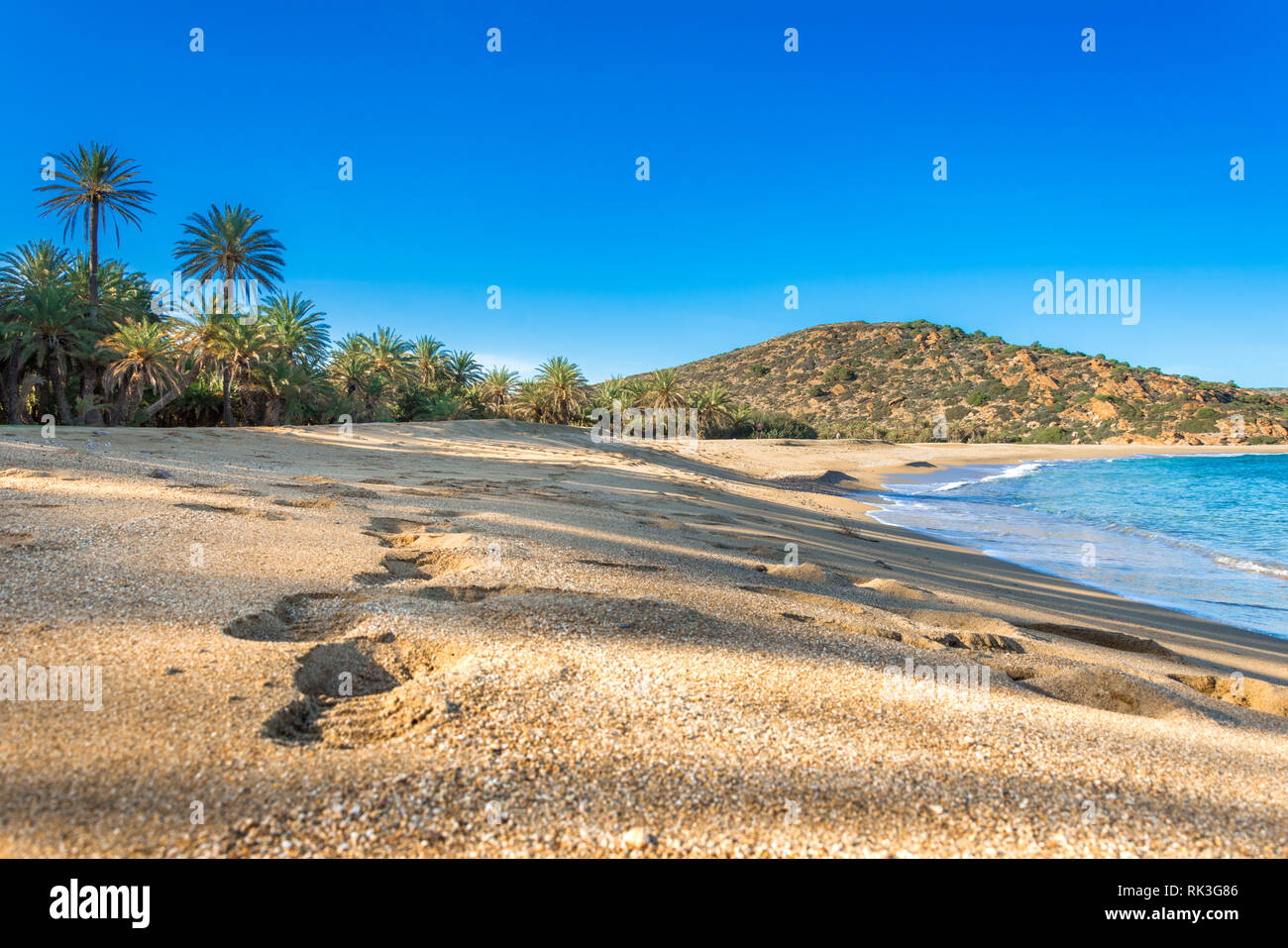 Scenic landscape of palm trees, turquoise water and tropical beach, Vai ...