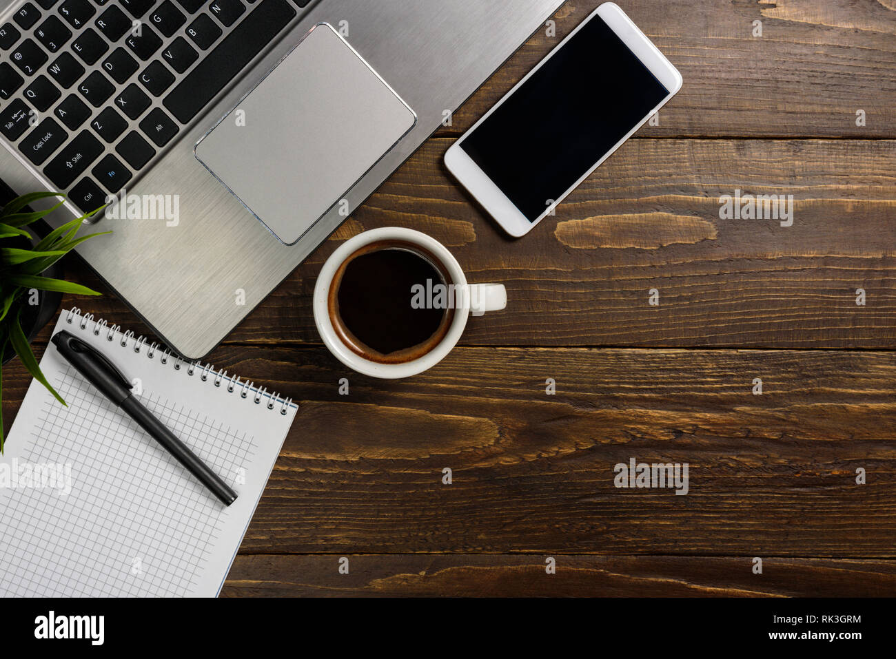 Working place top view with laptop, phone, coffee and notebook Stock ...