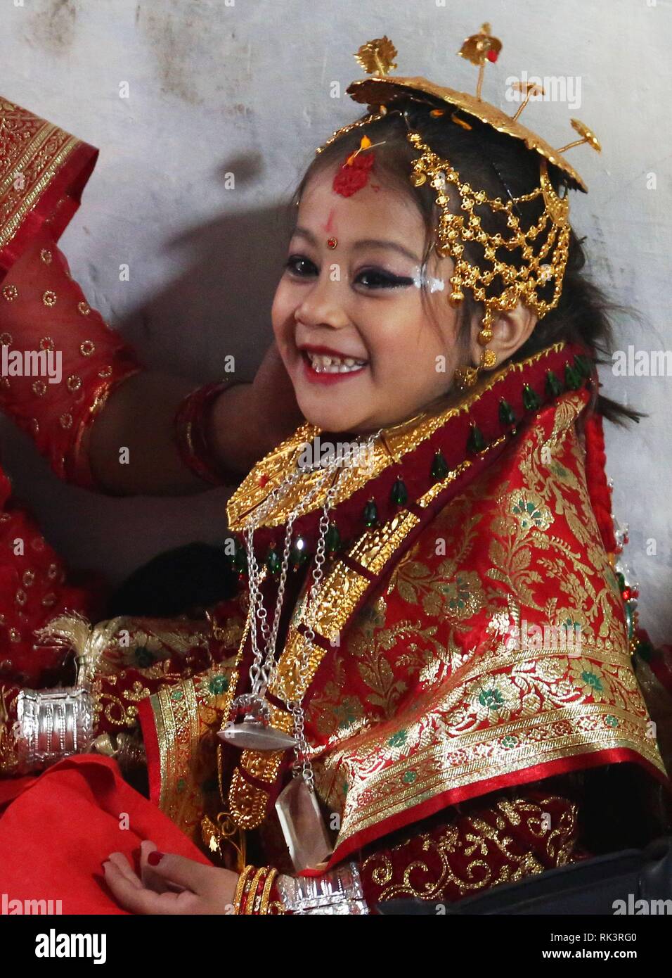 Kathmandu, Nepal. 9th Feb, 2019. A girl from Newar community attends a ...