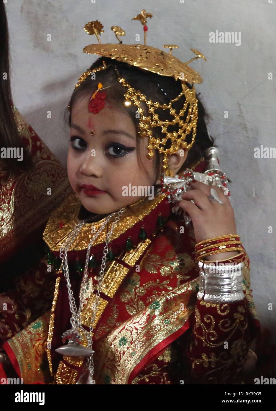 Kathmandu, Nepal. 9th Feb, 2019. A girl from Newar community attends a ...