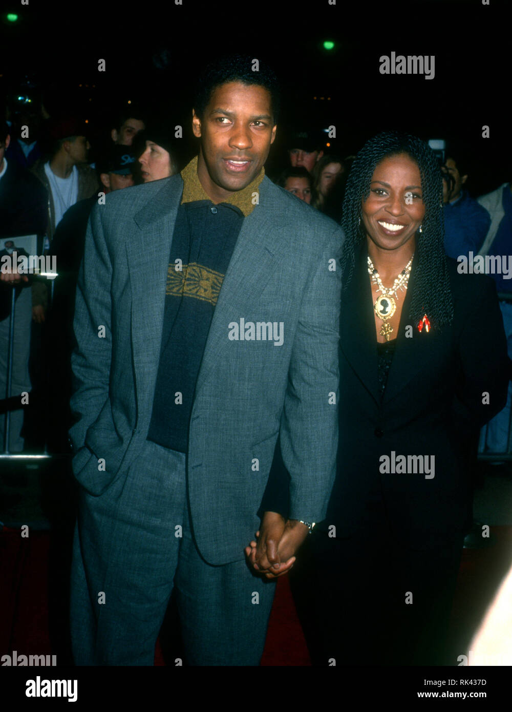 CENTURY CITY, CA - DECEMBER 14: Actor Denzel Washington and wife ...