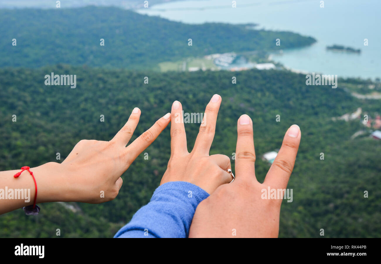 Hands reaching out to green hills in summer mountains Stock Photo - Alamy