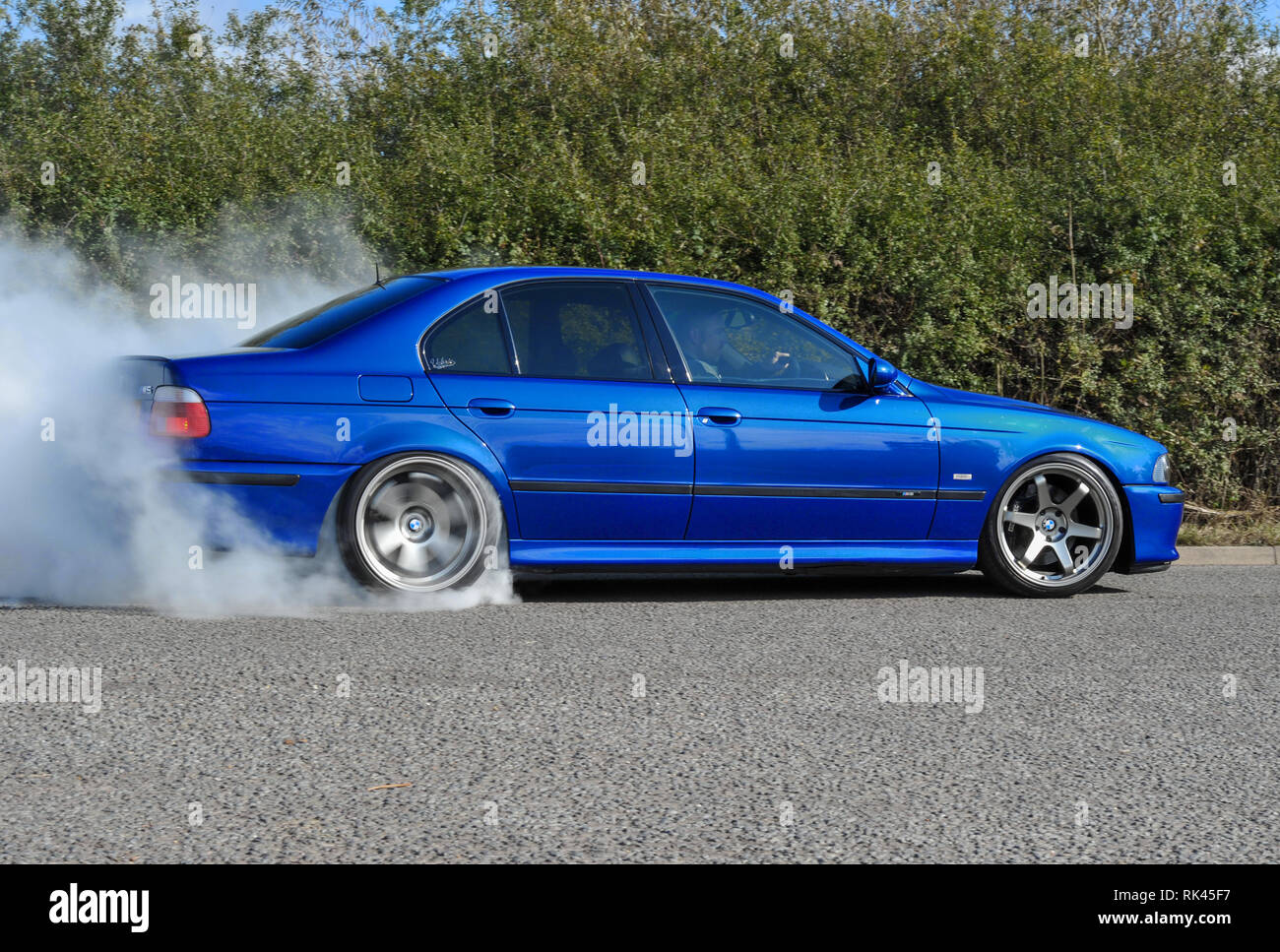 Massive tyre smoking burnout by BMW E39 M5 super saloon modern classic ...