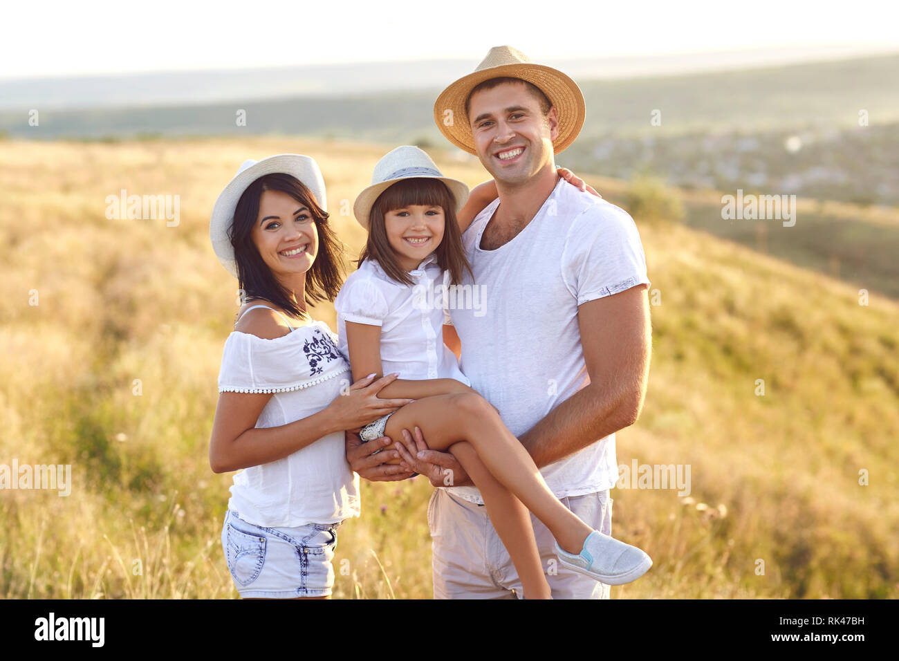 Family outdoors on sunset hi-res stock photography and images - Alamy