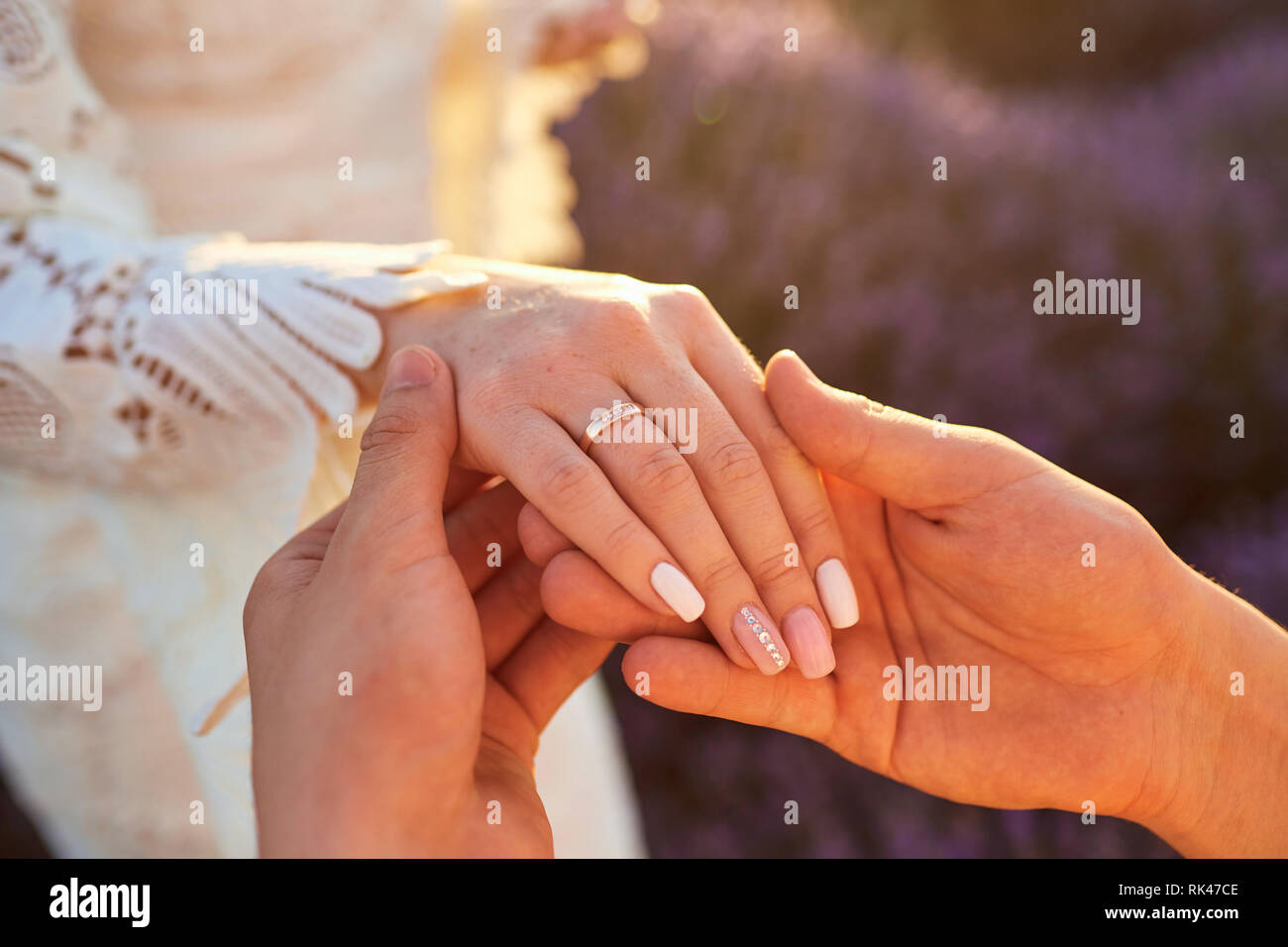 Young man proposal summer field hi-res stock photography and images - Alamy