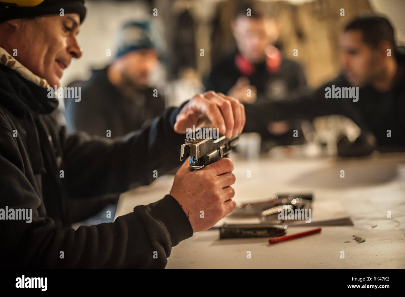 Folding and Install handgun. Disassemble pistol and cleaning. Complete ...