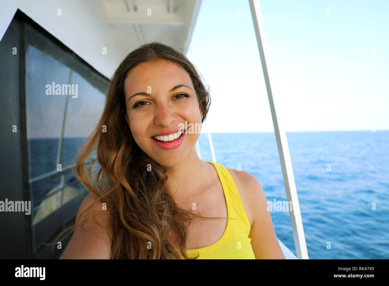 Selfie photo of young model woman on luxury travel cruise vacation in ...