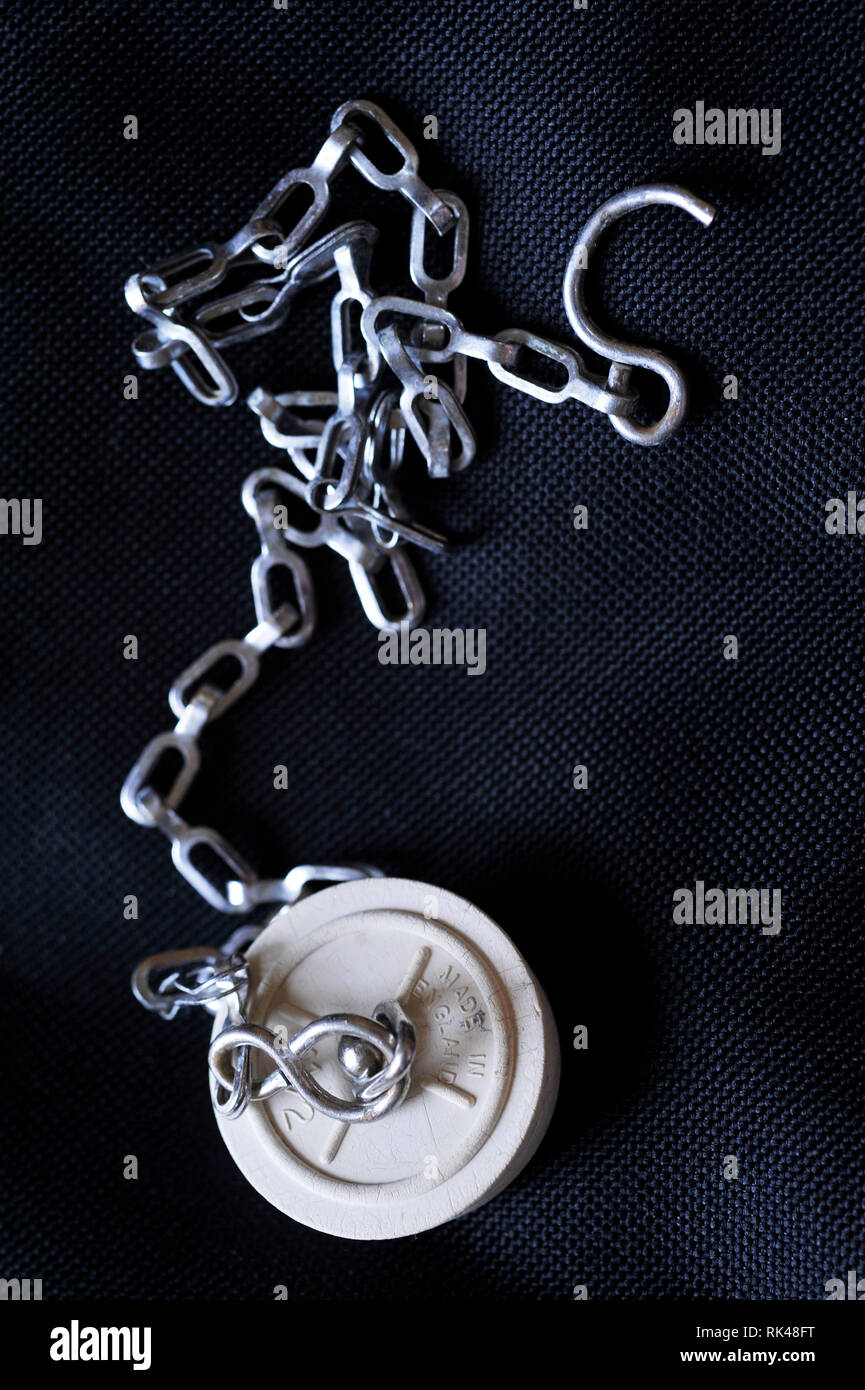 rubber sink plug and chain Stock Photo - Alamy