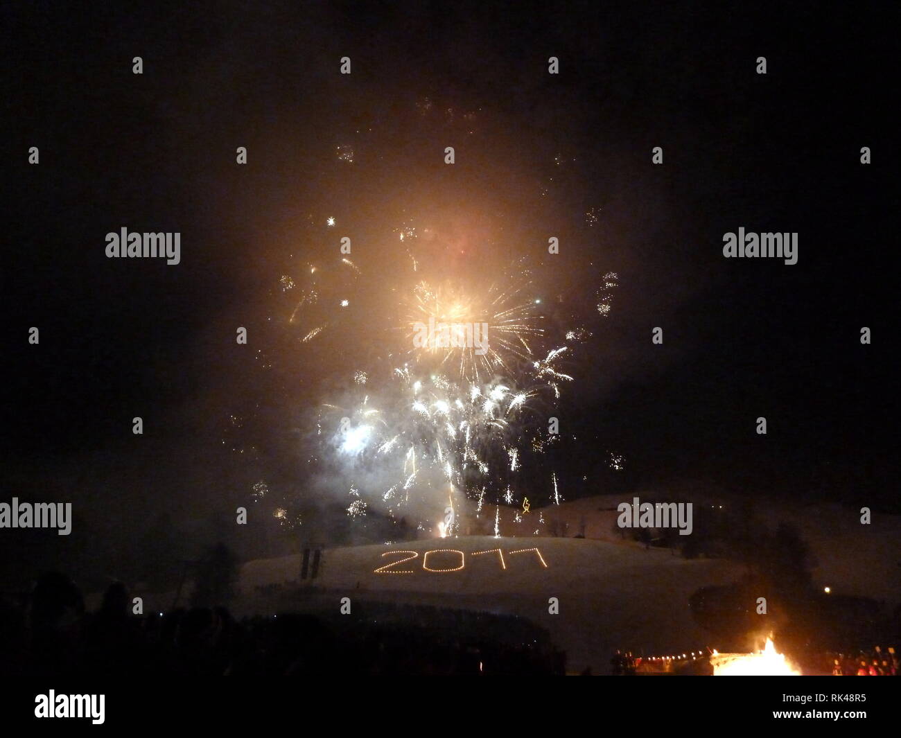 Fireworks, new year and snow Stock Photo - Alamy